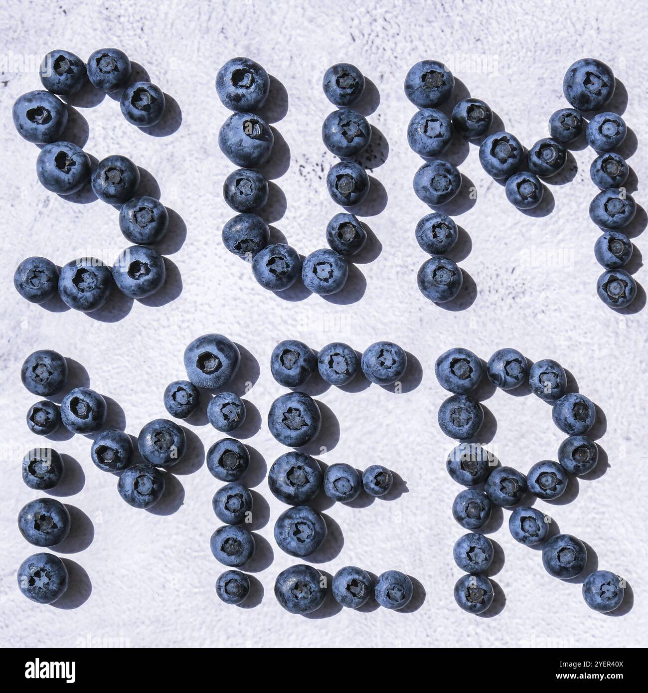 Summer inscription lined from blueberries. Fruits and berries ...