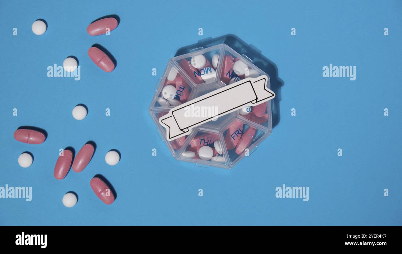 Closeup of medical pill box with doses of tablets for daily take ...