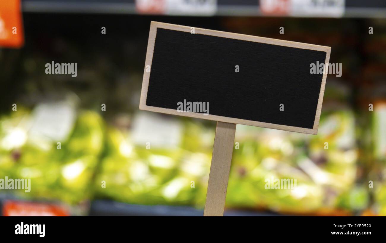 Blank Black billboard against groceries shop Empty mockup template Blackboard label at shopping ...