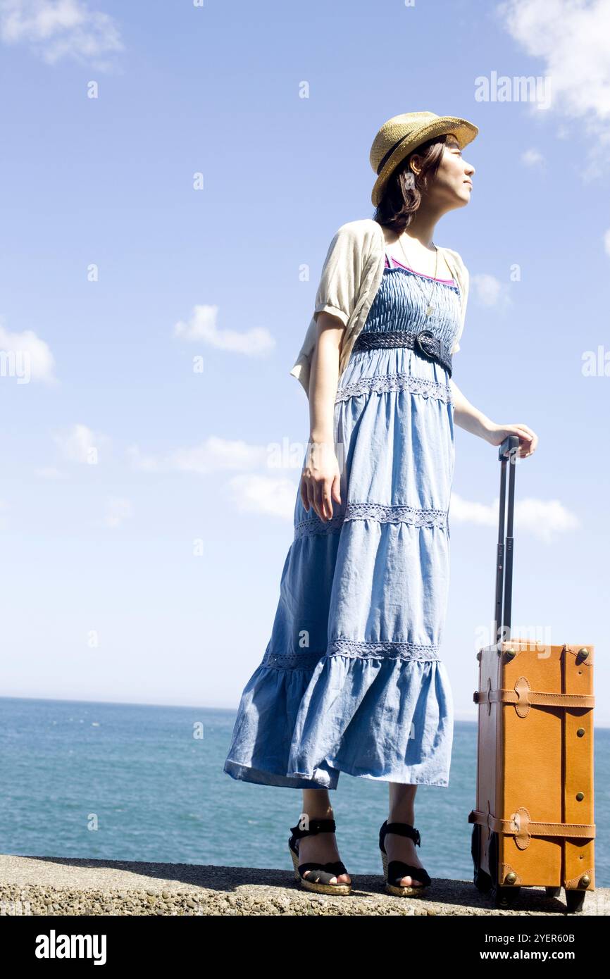 Carry on bag woman hi-res stock photography and images - Alamy