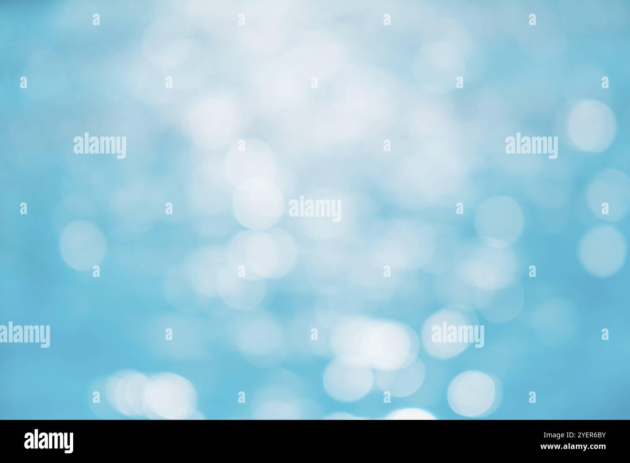 Defocused blured Pure blue water in the swimming pool with light ...