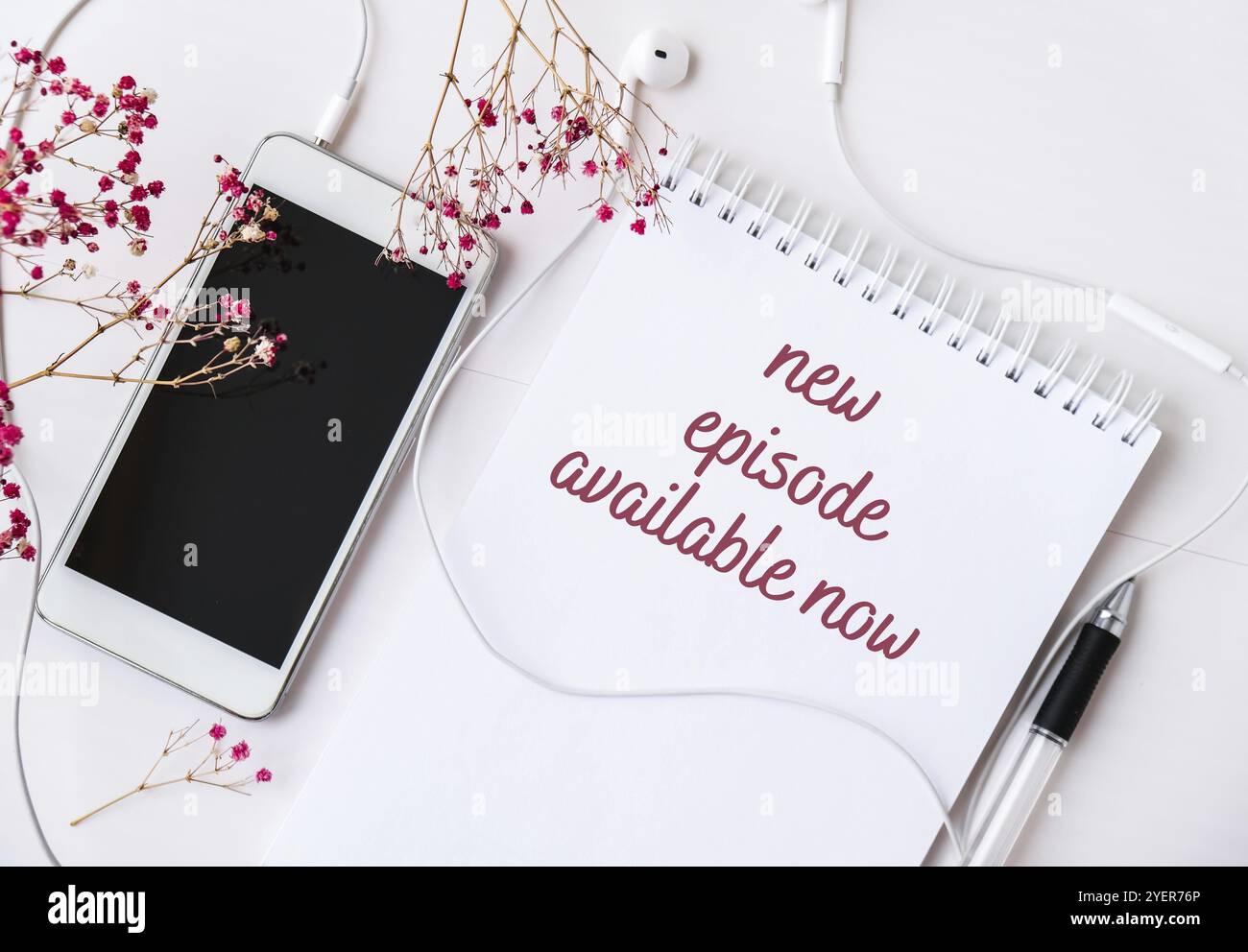 Notebook with NEW PODCAST EPISODE available now lettering. Headphones ...