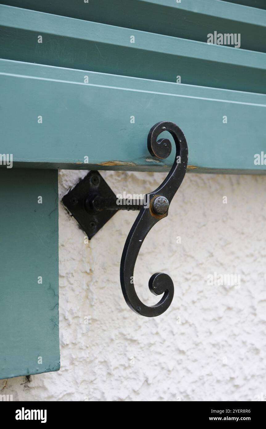 Design of the clasp on the window opening door Stock Photo - Alamy