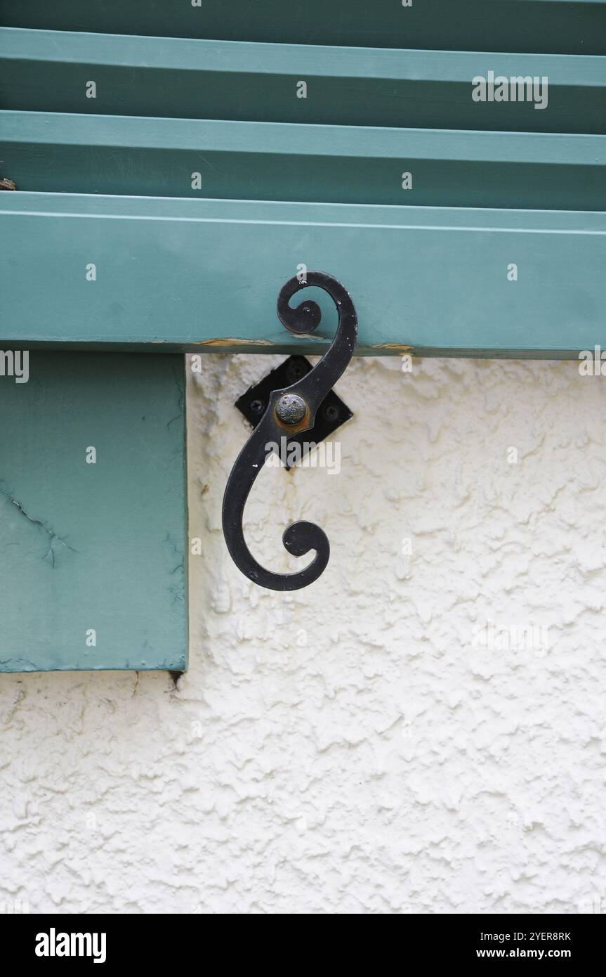 Design of the clasp on the window opening door Stock Photo - Alamy