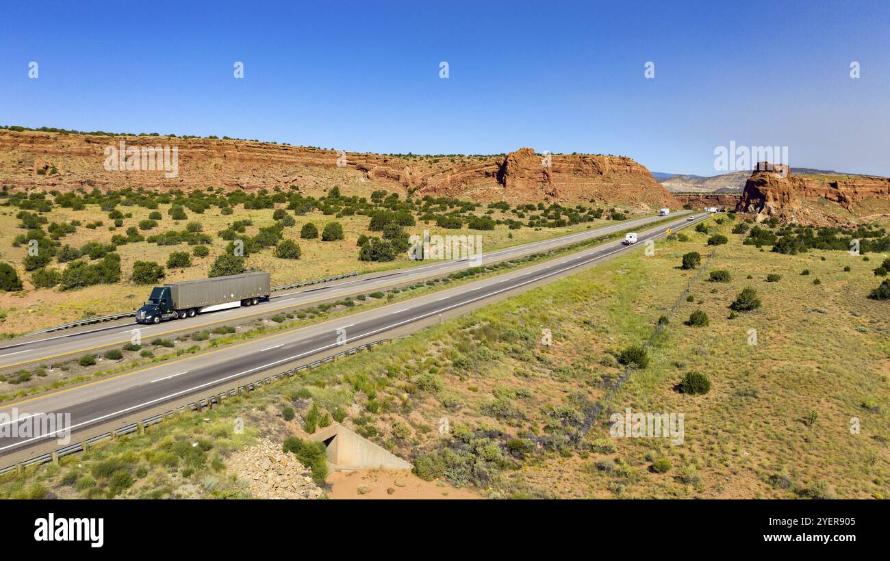 Vehilces Travel along close to the Laguna Pueblo along highway 40 in ...