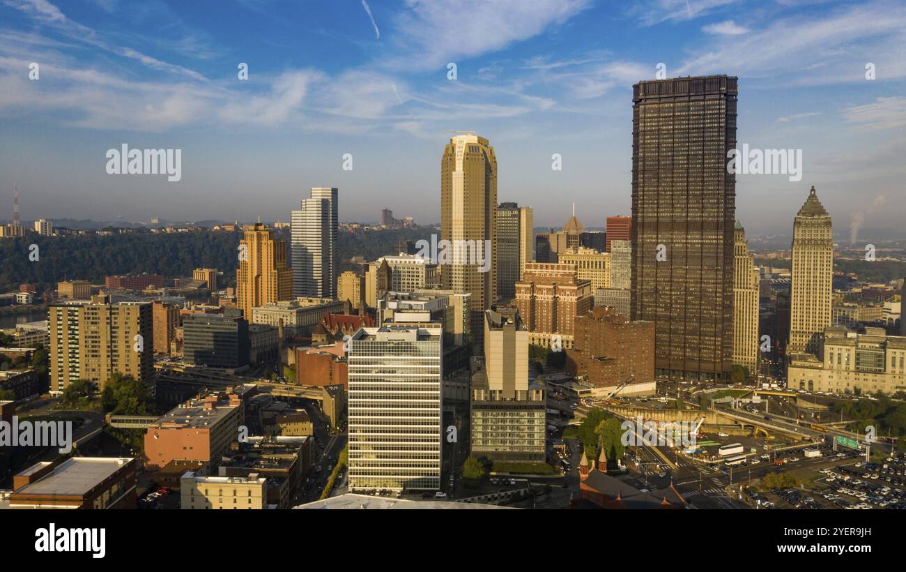 Blue skies and some air pollution linger over the downtown urban city ...