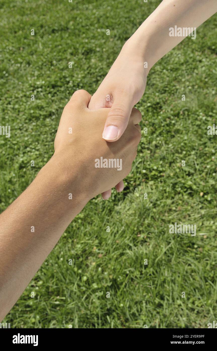 Hand and hand Stock Photo - Alamy