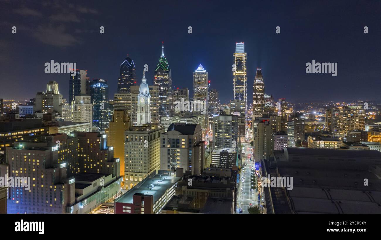 Aerial view night sky over the neighborhoods and streets of ...