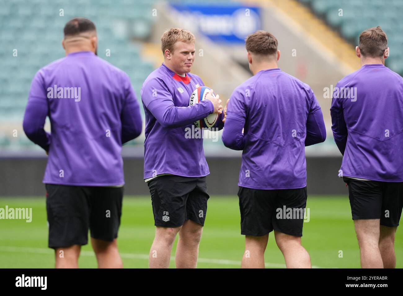 England's Fin Baxter (second left) during a team run at the Allianz ...