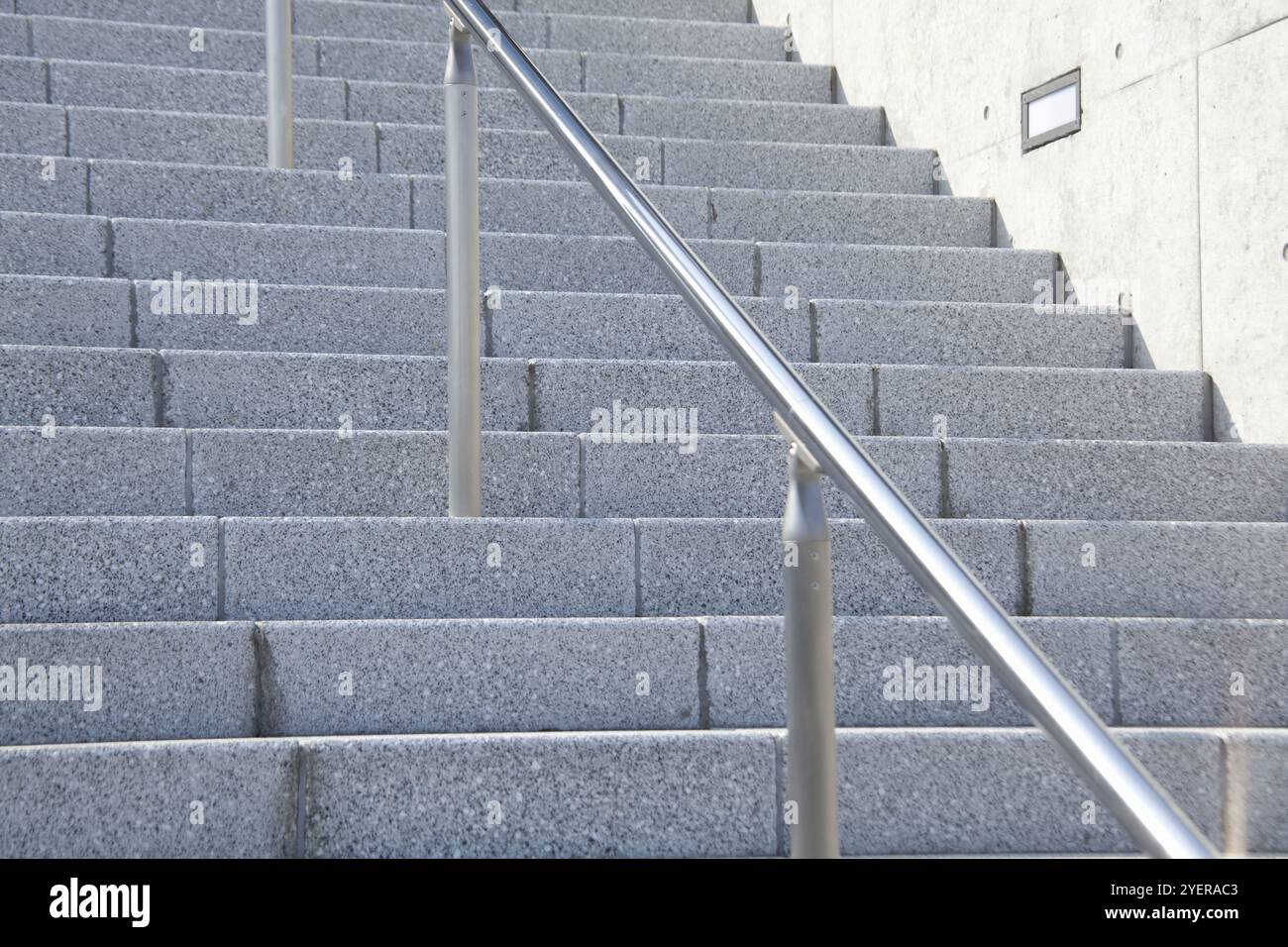 Stone staircase and stainless steel pipe handrail Stock Photo - Alamy