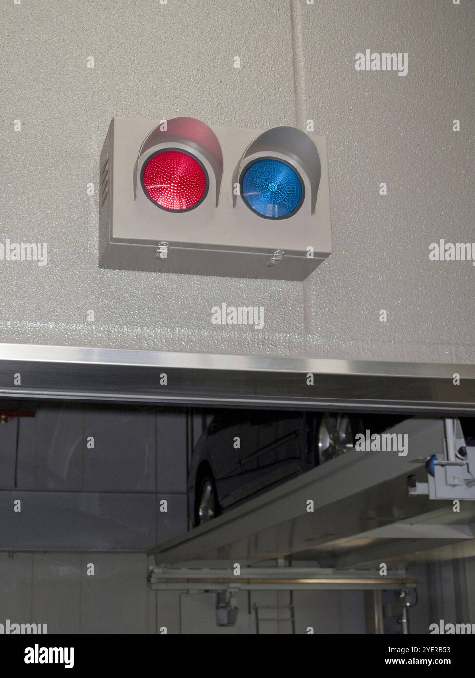 Red and blue traffic lights in multi-storey car park Stock Photo - Alamy