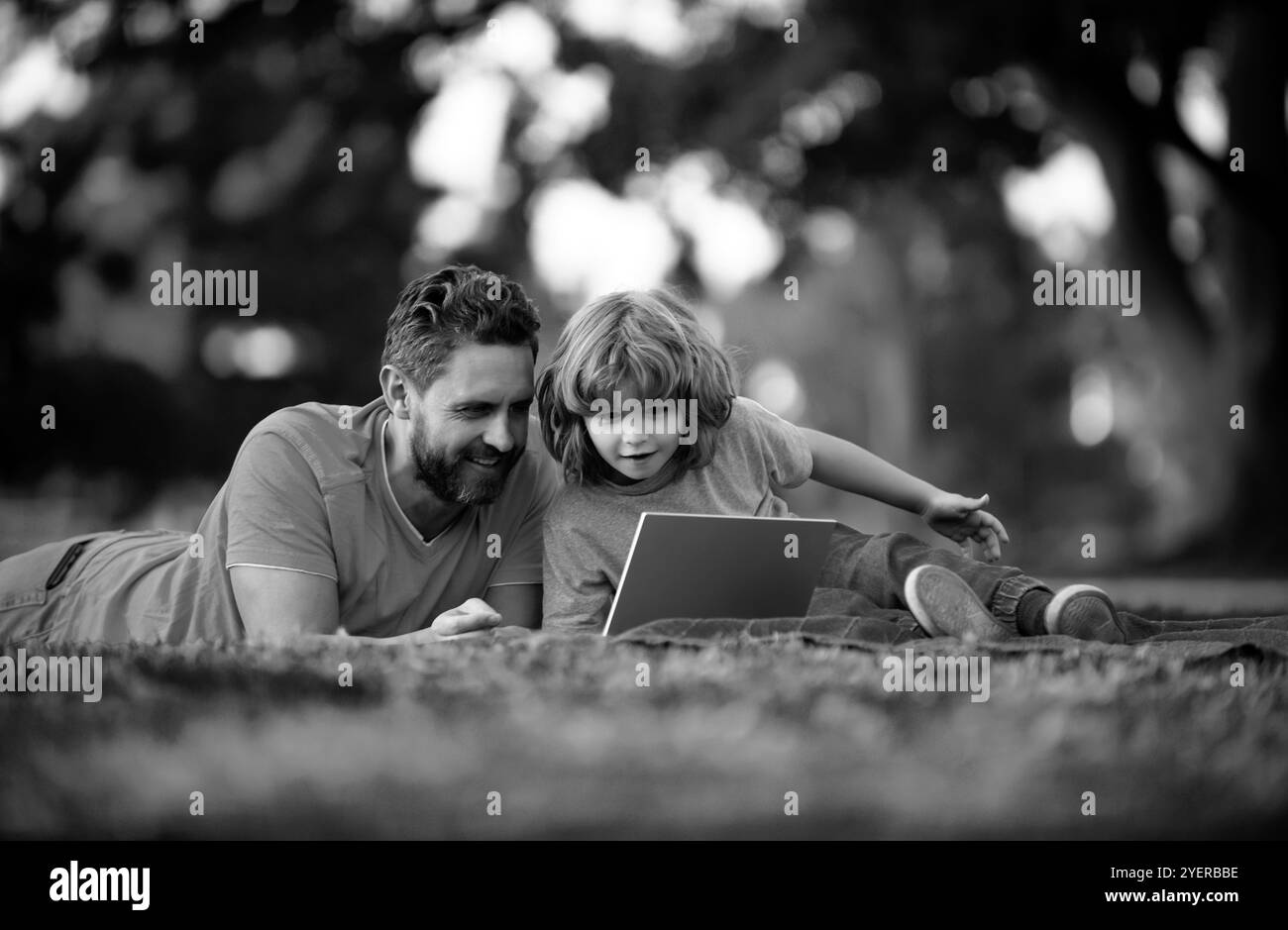 Father son outdoor enjoying Black and White Stock Photos & Images - Alamy
