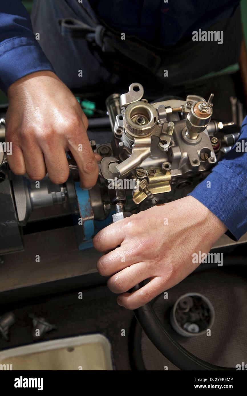 Automotive component assembly work Stock Photo - Alamy