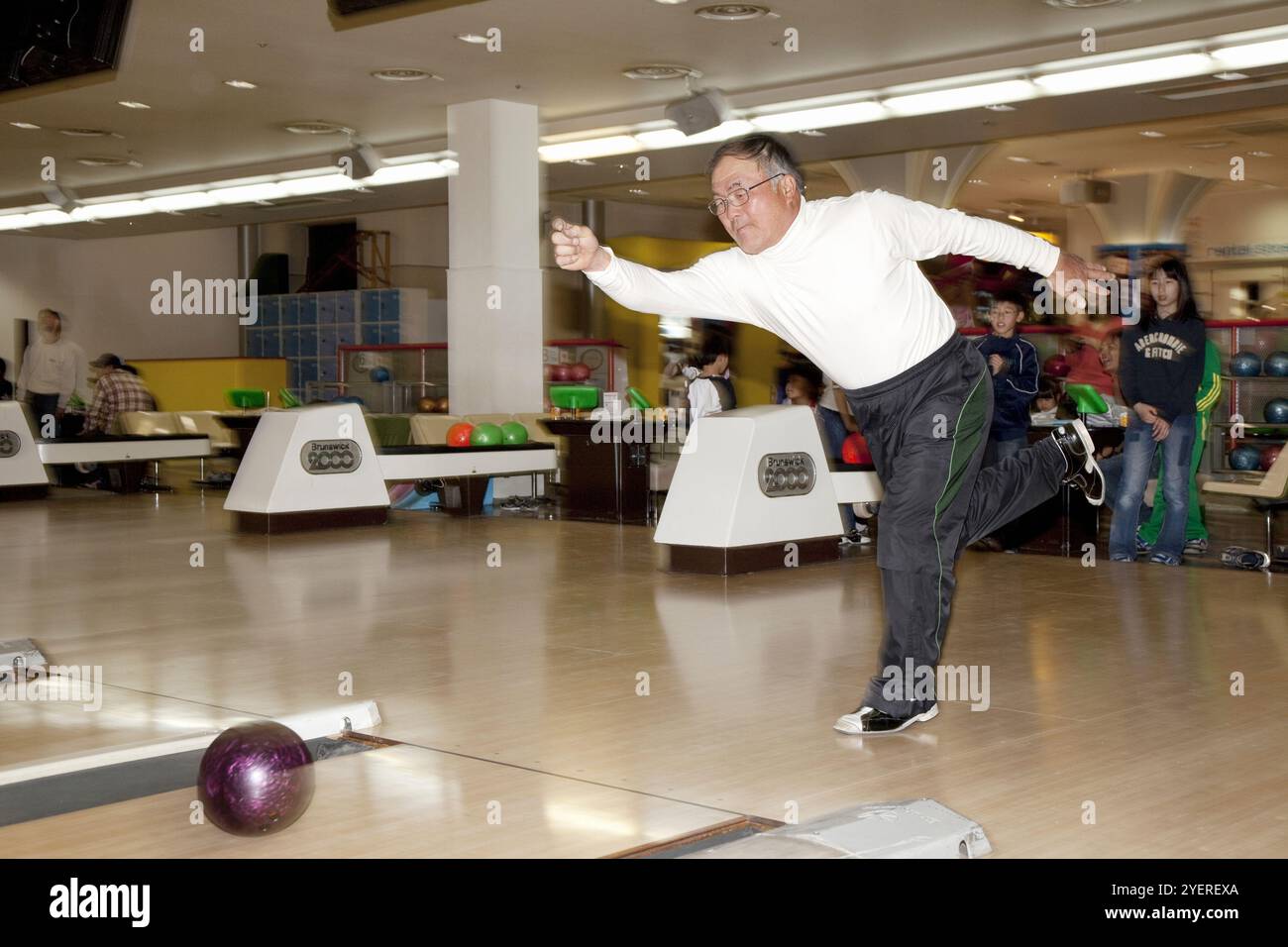 Senior citizens bowling Stock Photo - Alamy