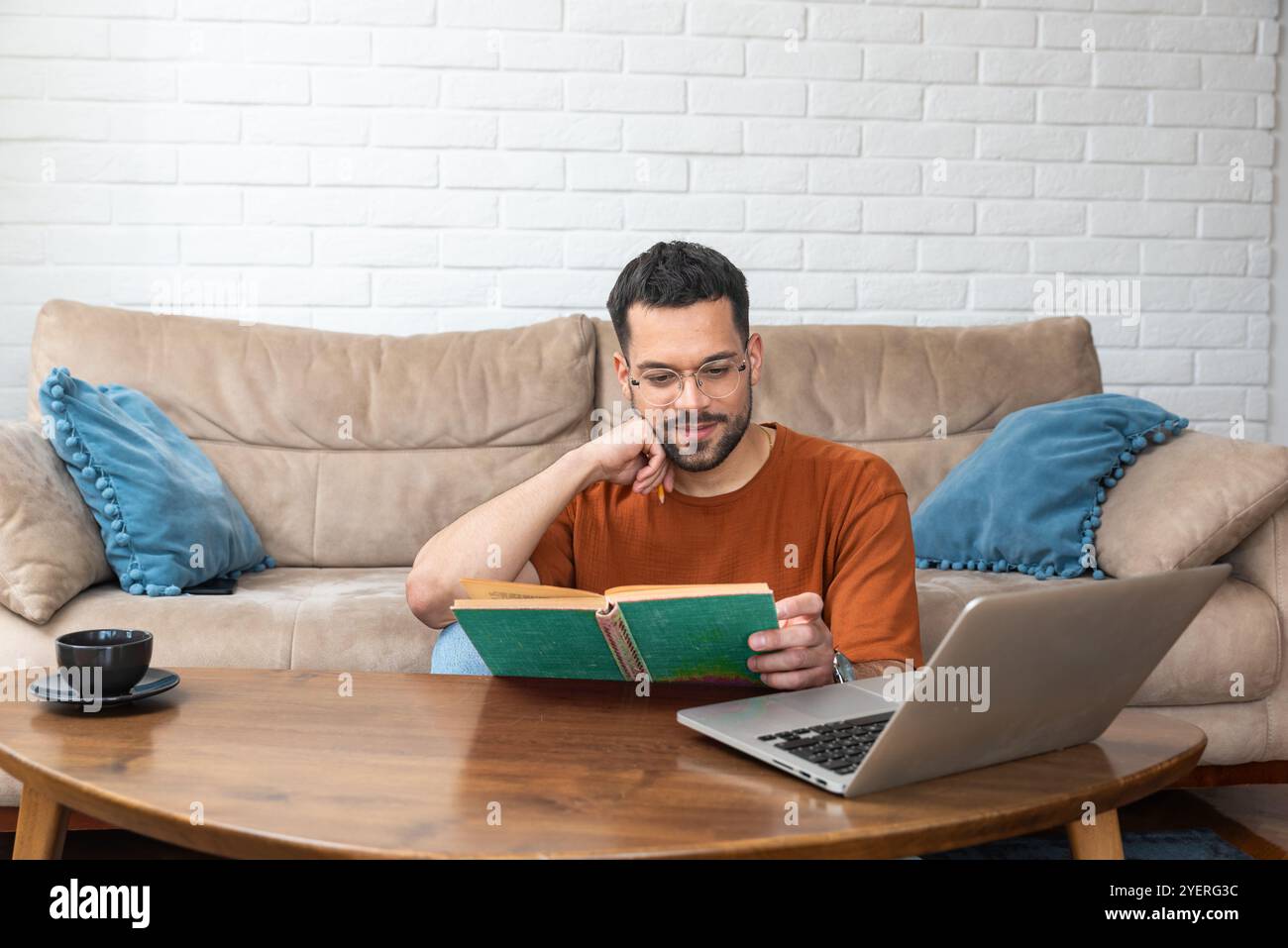 Young religious muslim man study and reading islamic book, interested ...