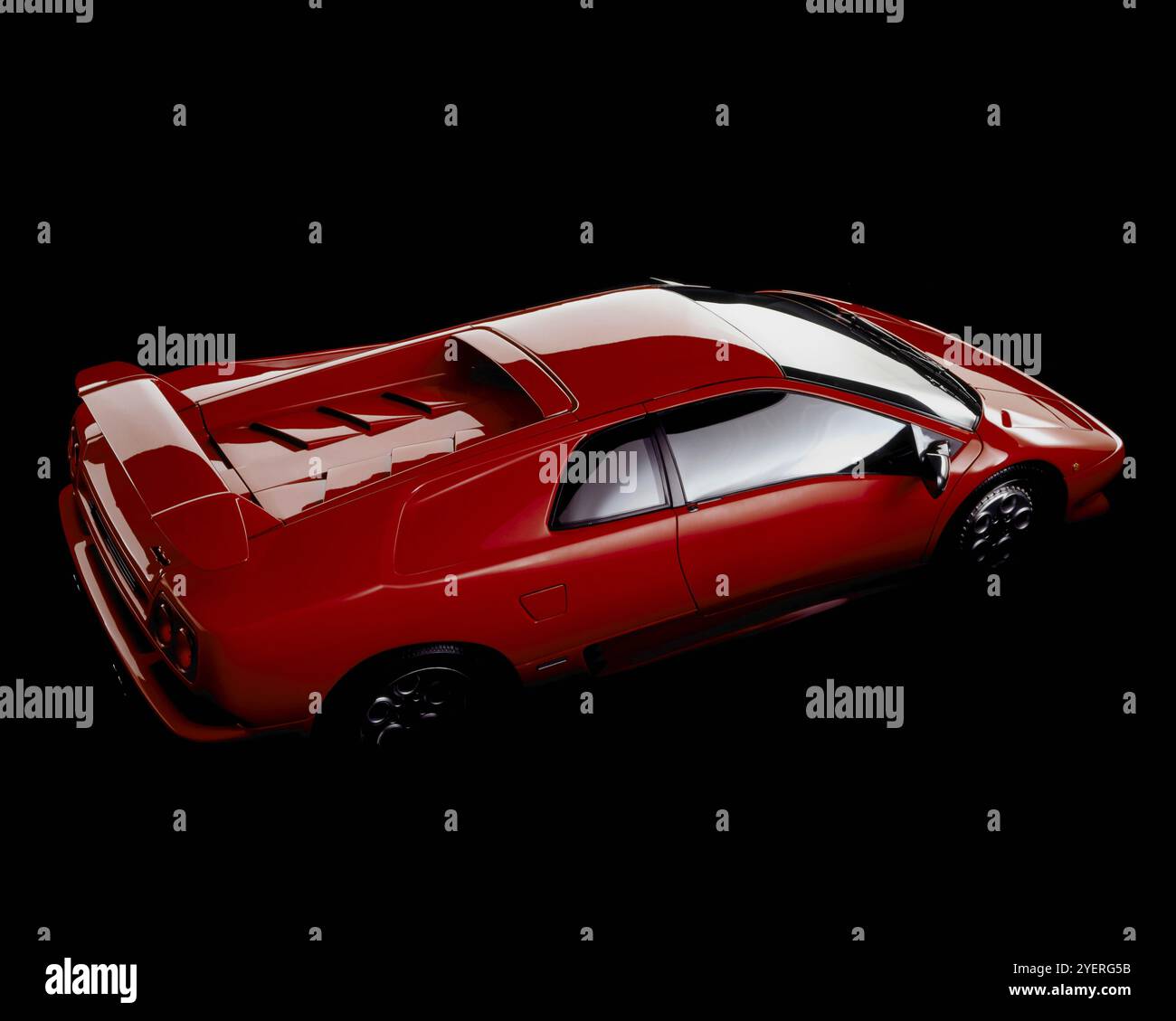 Supercar oblique overhead with black background Stock Photo - Alamy