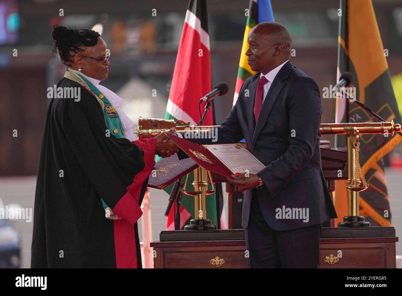 Kenya's new Deputy President Kithure Kindiki, right, is sworn into ...