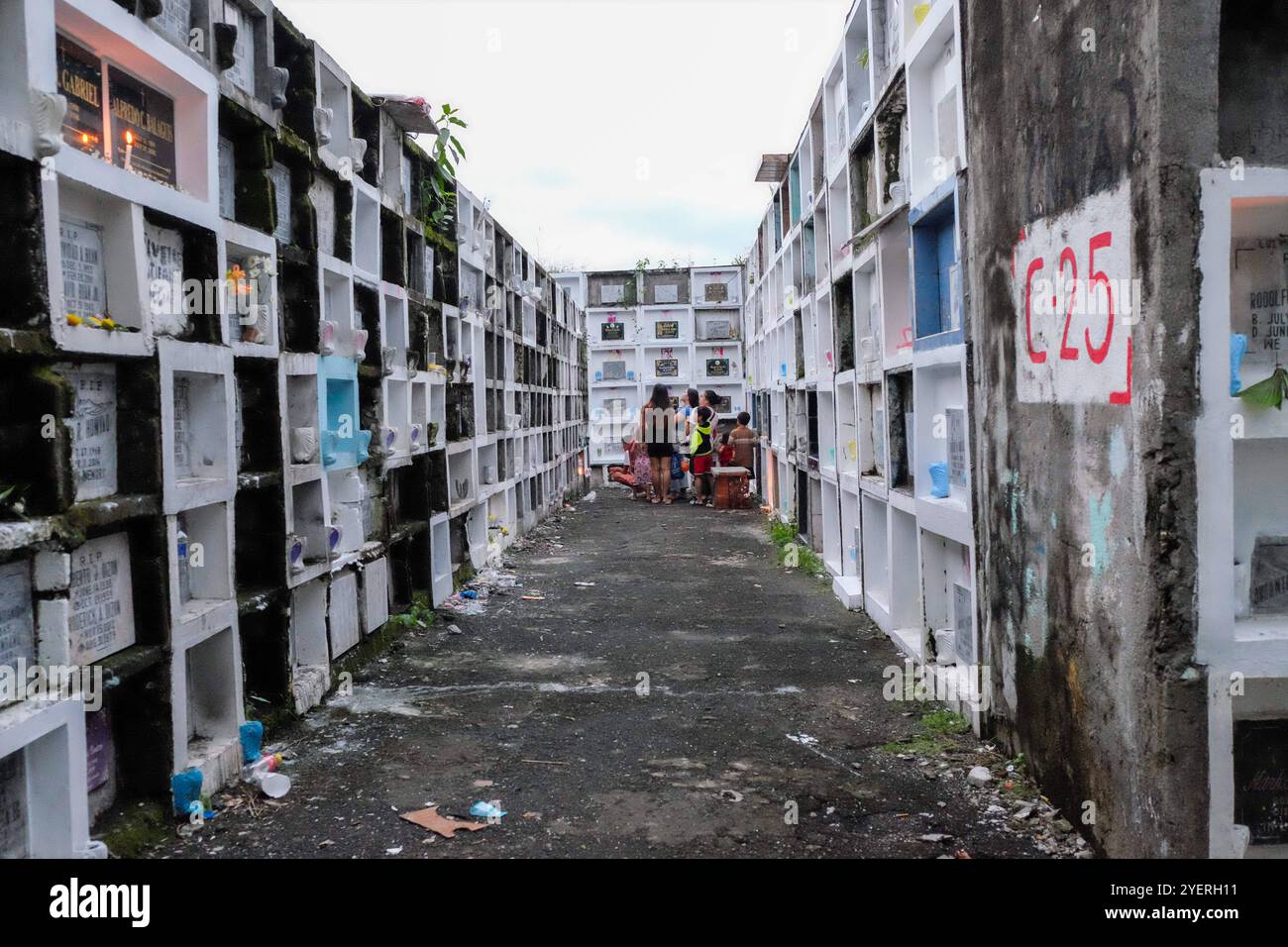 All Souls Day in Manila Filipinos visit their departed loved ones at Bagbag Cemetery in Quezon ...