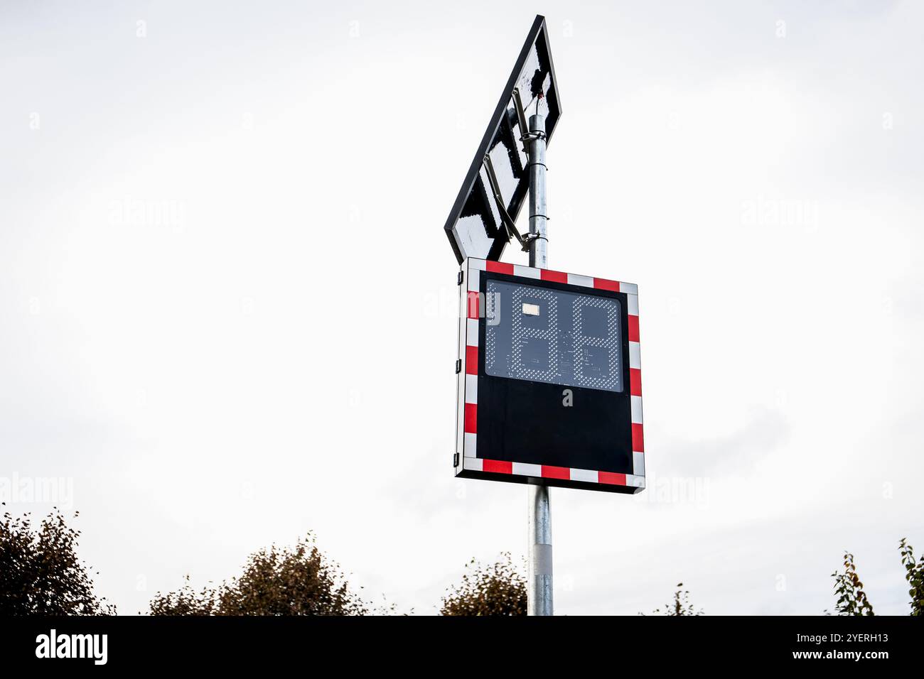 Speed limit zone and radar speed indicator sign on a street Stock Photo ...