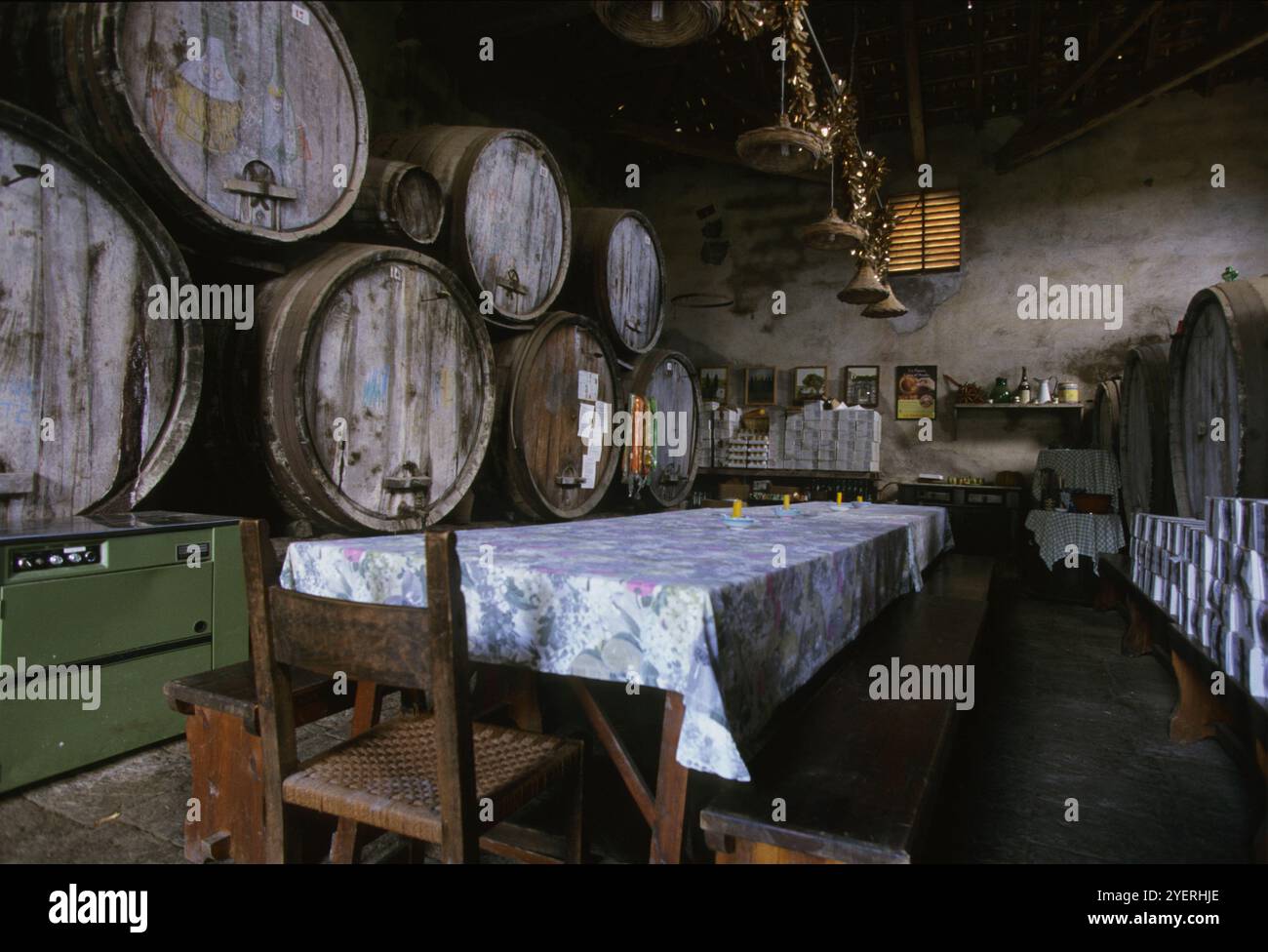 Table in wine cellar Stock Photo - Alamy