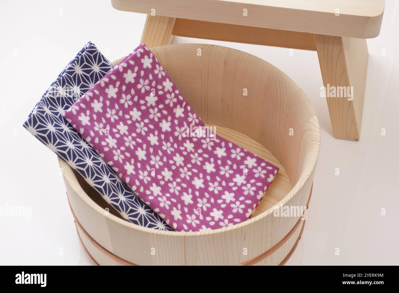 Natural wooden chair, wooden bucket and Japanese hand towel Stock Photo ...