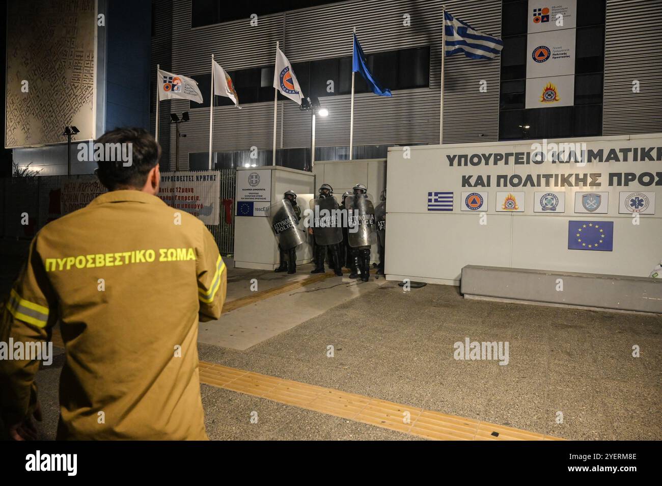 Athens, Greece. 31 October 2024. Seasonal firefighters shout slogans at ...