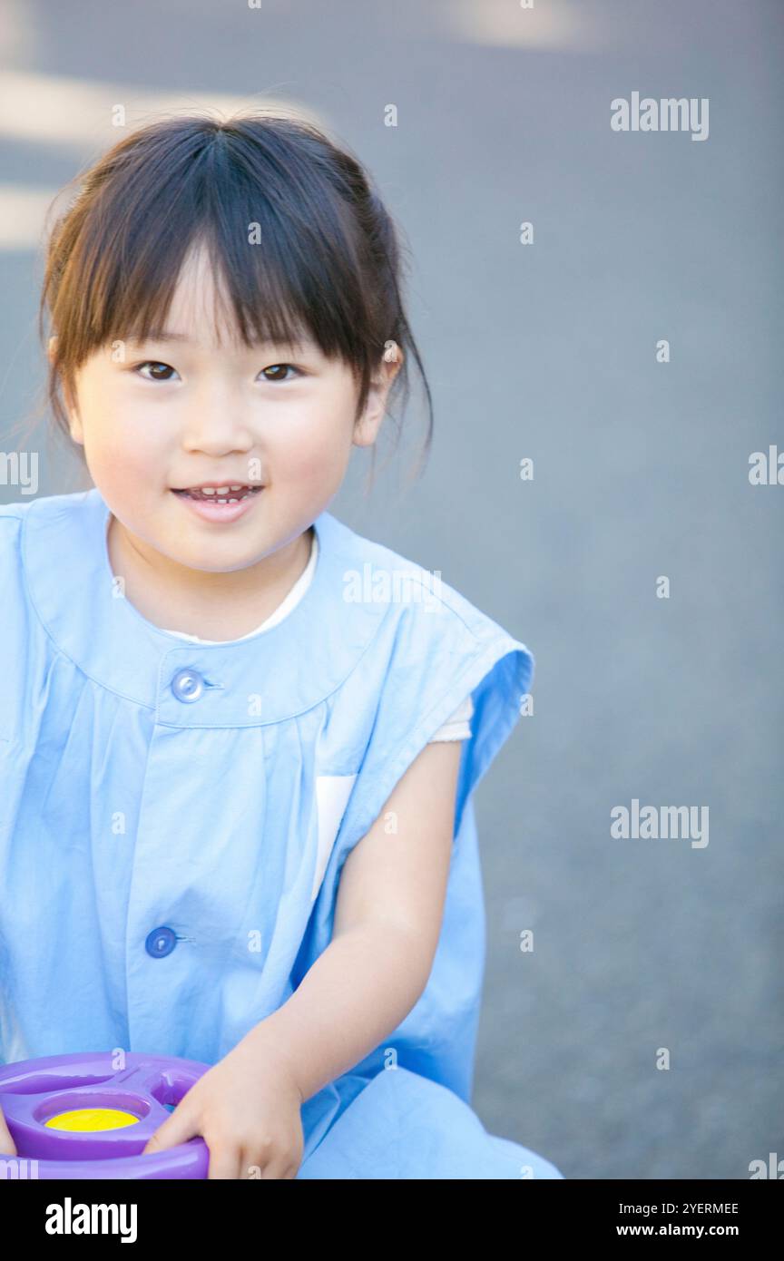 Girl playing toy car hi-res stock photography and images - Alamy