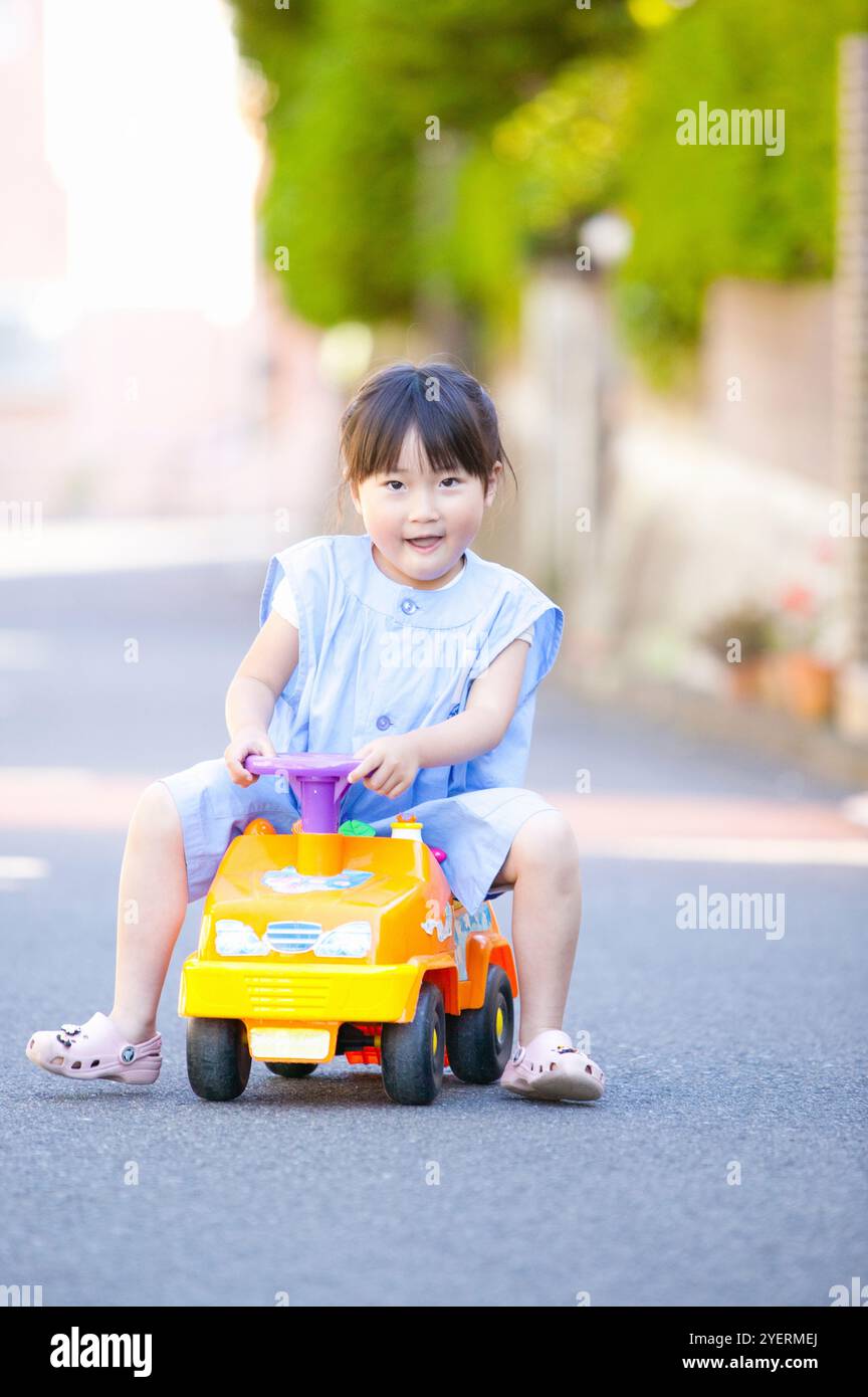Woman child playing toy hi-res stock photography and images - Alamy