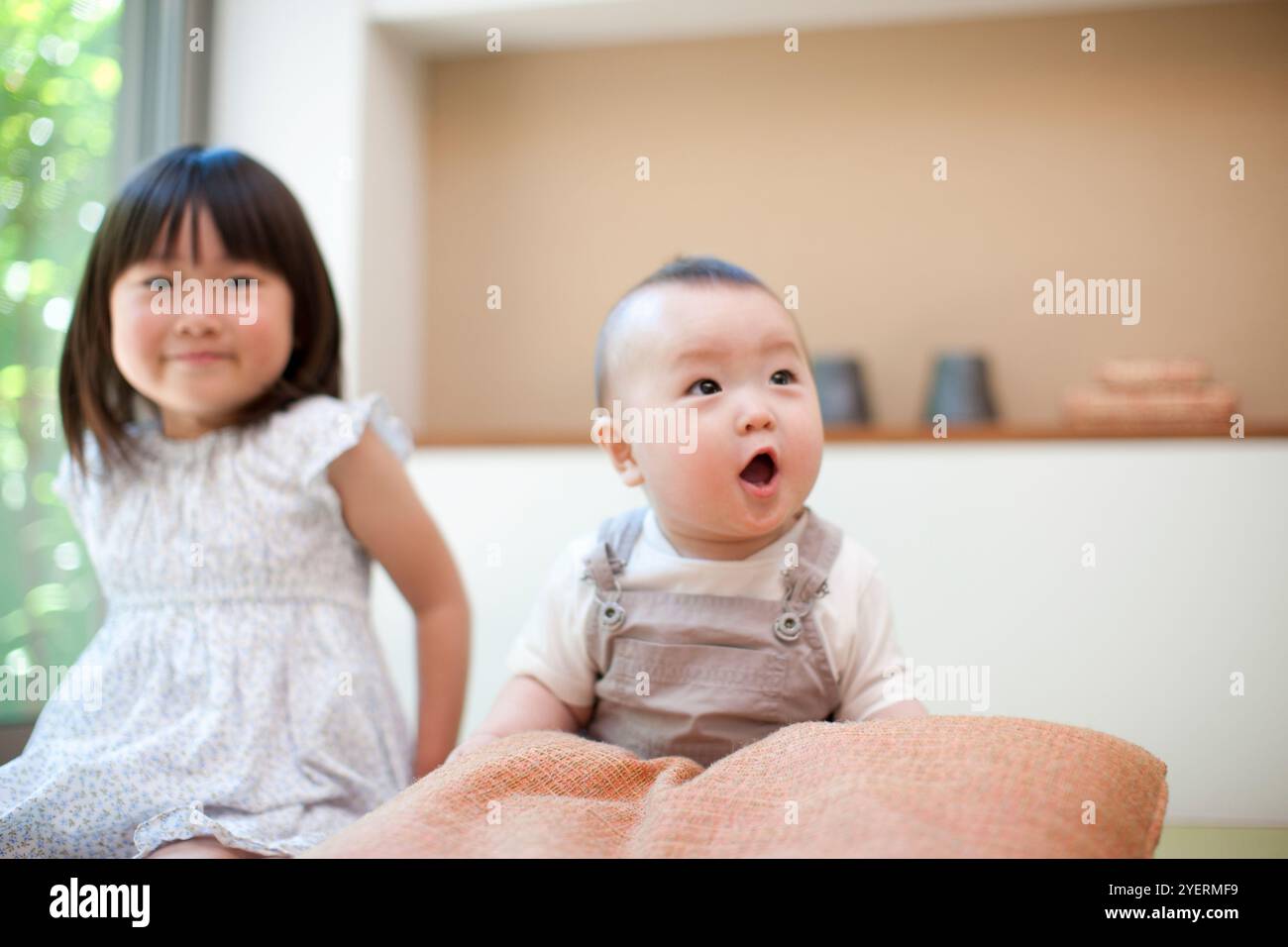 A sister and brother who get on well with each other Stock Photo - Alamy