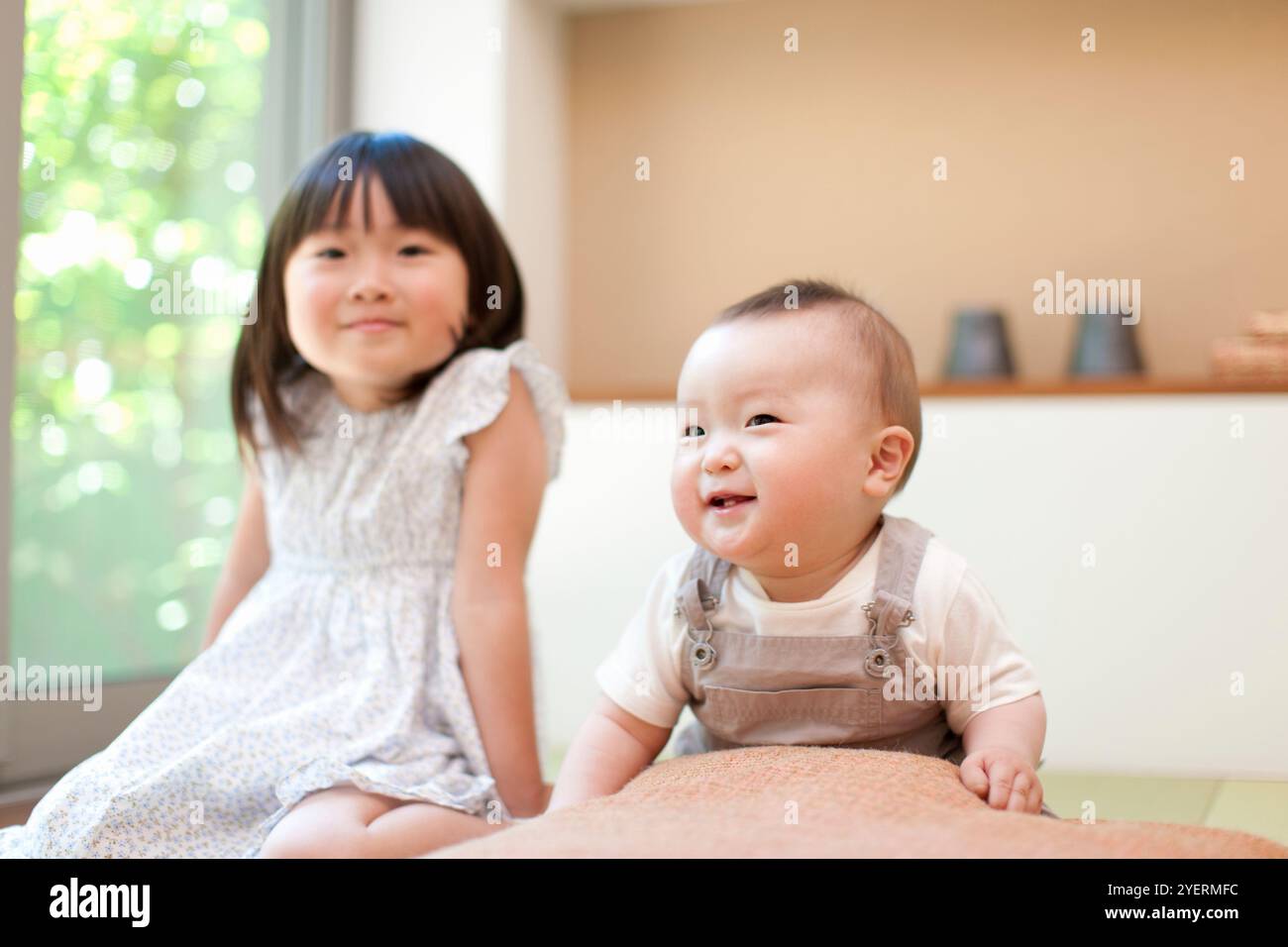 A sister and brother who get on well with each other Stock Photo - Alamy