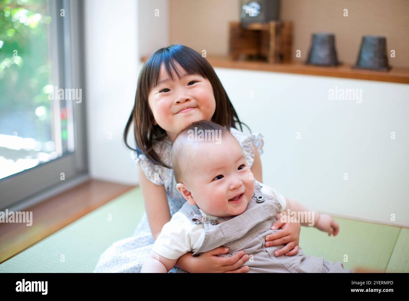 A sister and brother who get on well with each other Stock Photo - Alamy