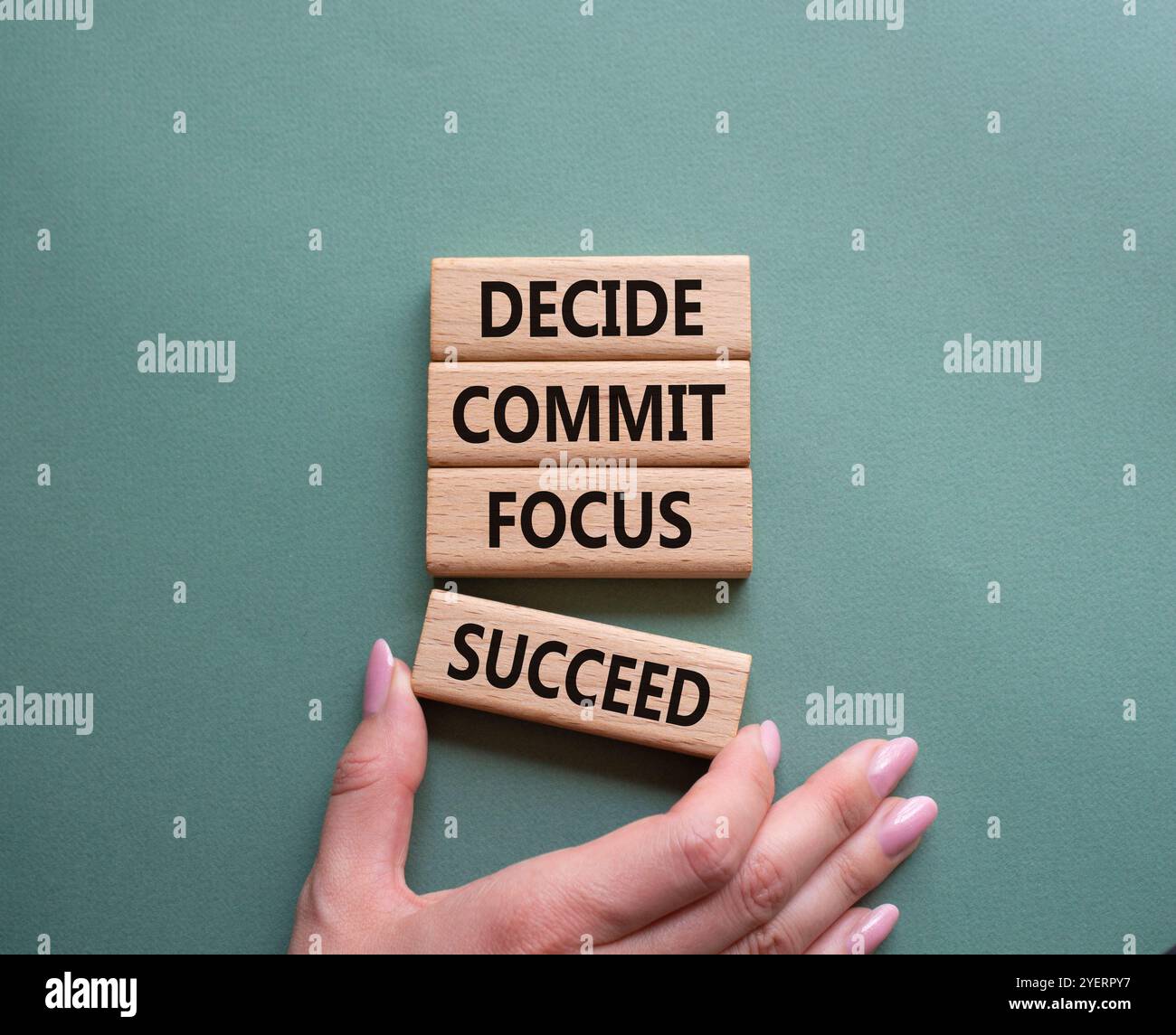 Decide Commit Focus Succeed symbol. Concept words Decide Commit Focus Succeed on wooden blocks ...