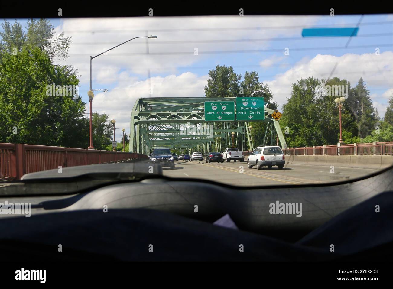 View from inside a car driving north on Interstate 5 with green signs ...