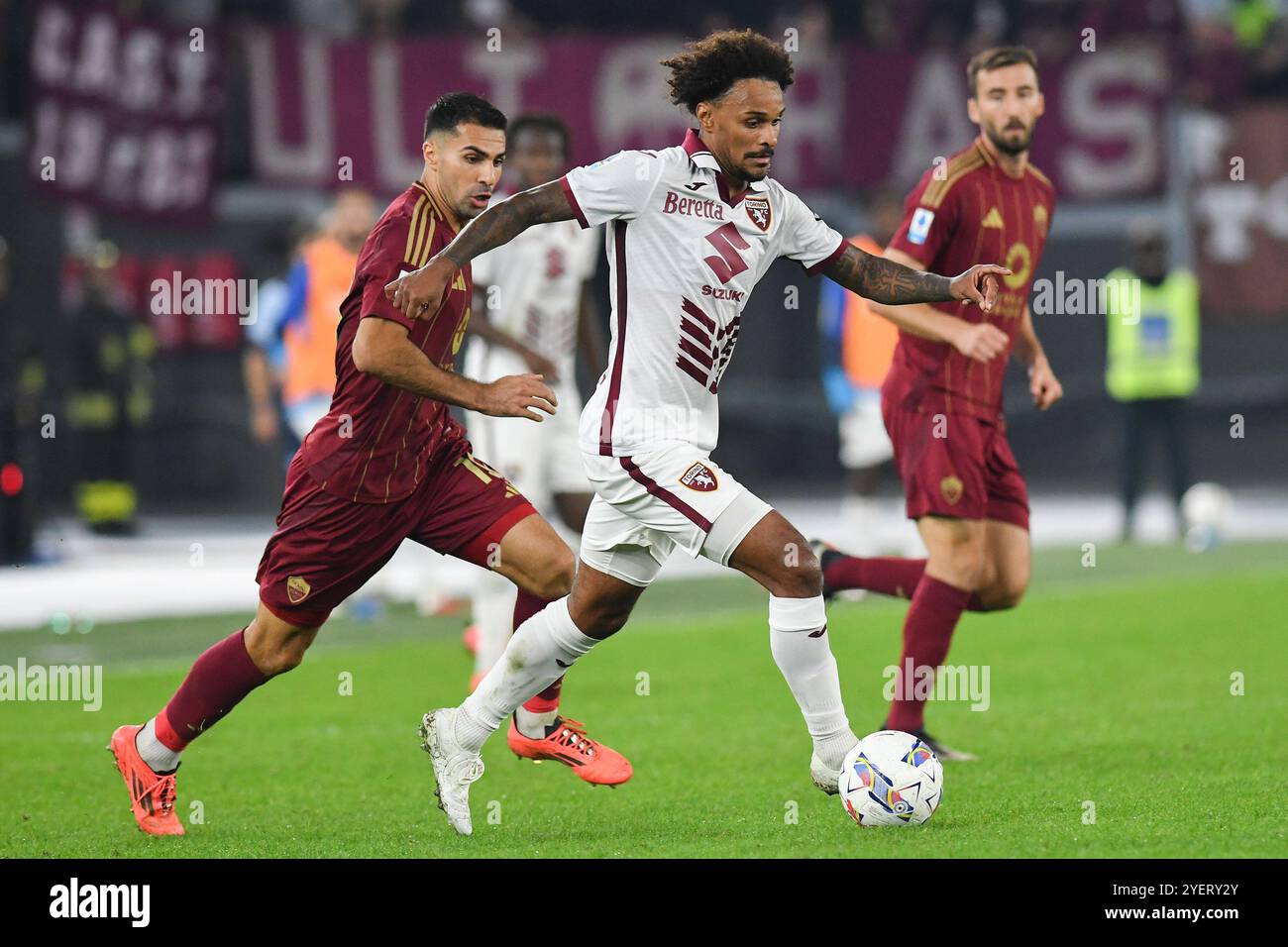 Zeki Celik of AS Roma (L), Valentino Lazaro of Torino (C), and Bryan ...