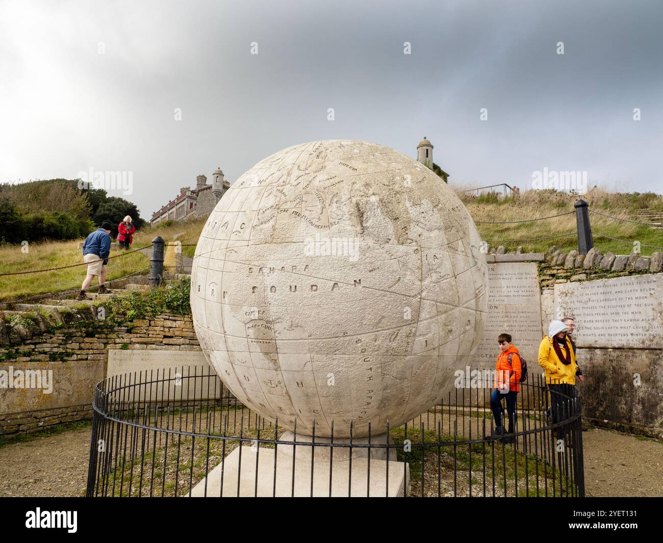 A limestone rock globe carved in the grounds of Durlston country park ...
