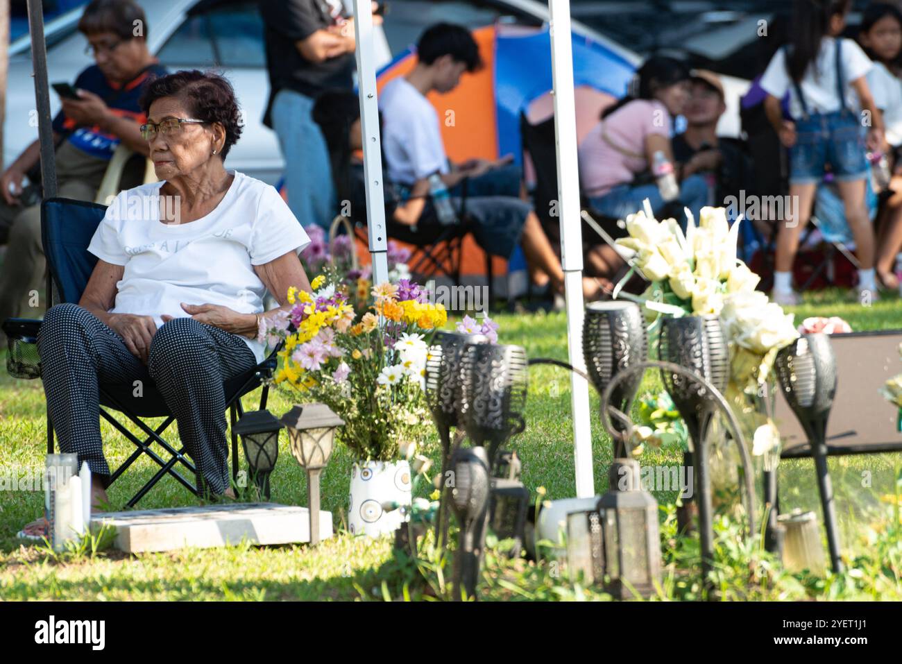 San Pablo, Laguna, Philippines. 1st Nov, 2024. A eldery woman sitting ...