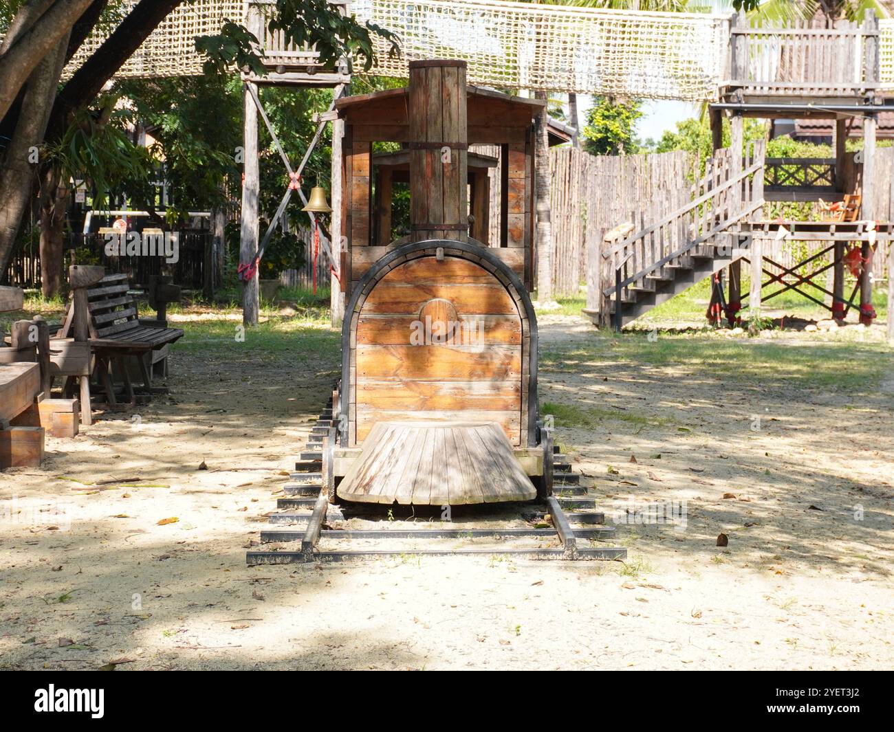 Summer park playground with swings, slides and climbing equipment ...