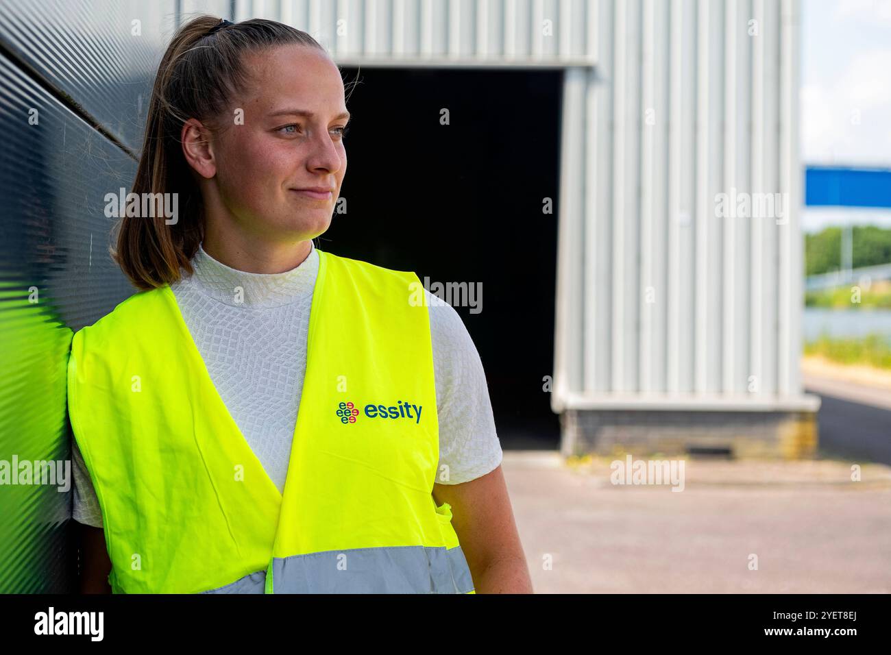 Portrait Female Factory Worker Portrait Female Factory Worker at a Paper Processing Plant in ...