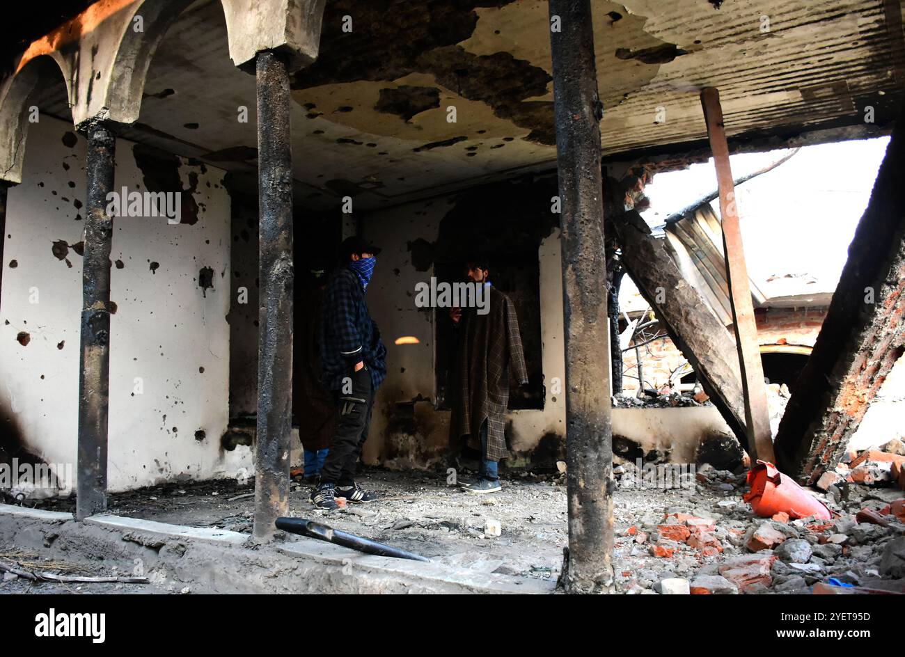 Kashmiri Muslims attend the funeral of rebel Abid Chopan who was killed ...