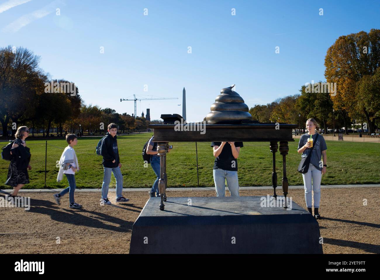 A bronze art installation depicting a 'poop' on former House Speaker ...