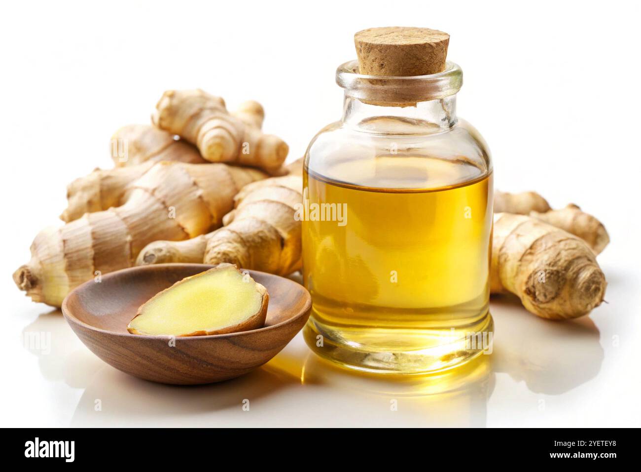 Herbal aromatic ginger with extract oil, over white background Stock ...