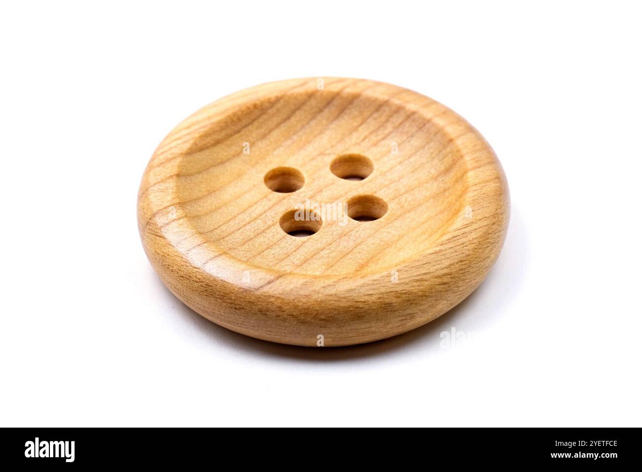 Round wooden button on white background Stock Photo - Alamy