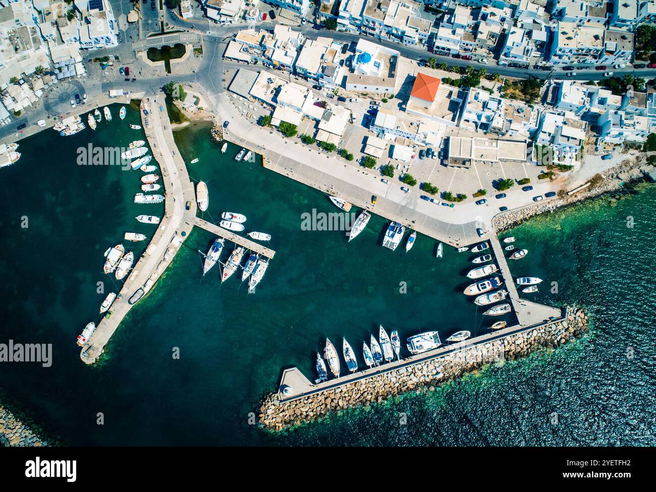 Aerial drone bird's eye view shot of scenic small town with small ... Aerial drone bird's eye view shot of scenic small town with small ...