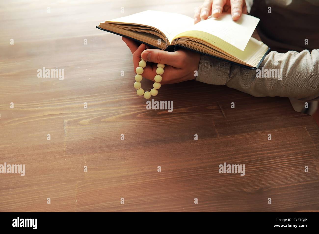 Reading religious literature. Open book. Man reads bible Koran Stock ...