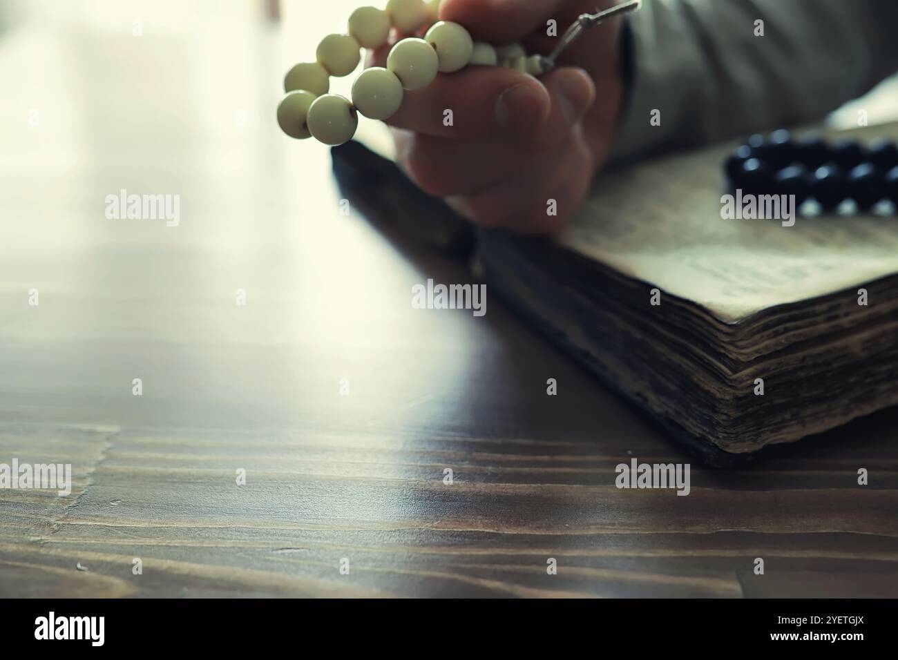 Reading religious literature. Open book. Man reads bible Koran Stock ...