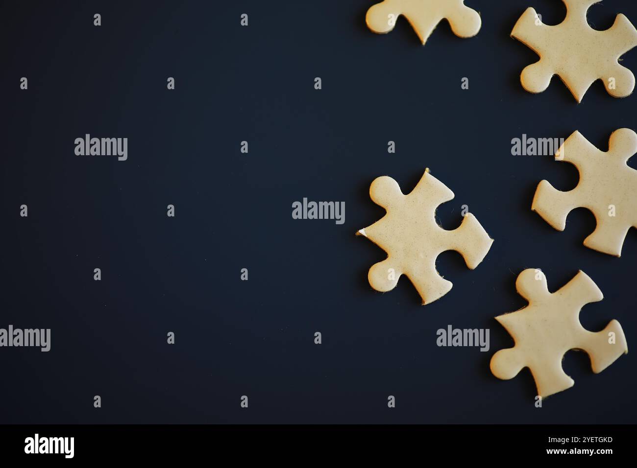 Clean puzzle elements on the background. Empty puzzle piece on table ...