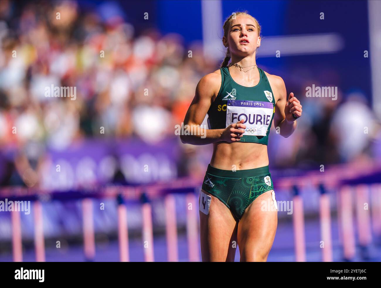 Marione Fourie participating in the 100 meters hurdles at the Paris ...