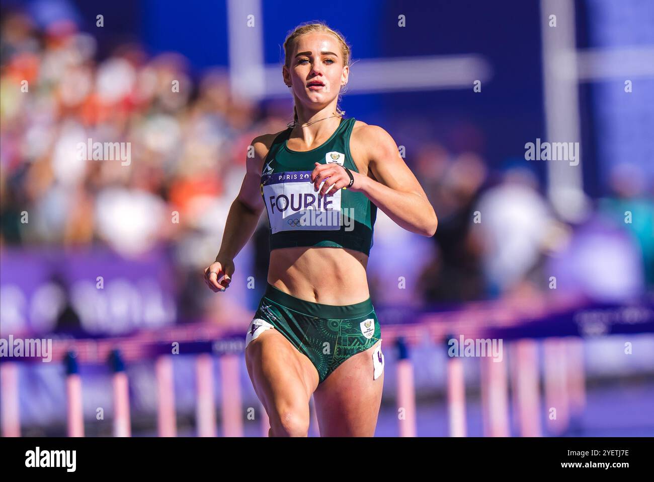 Marione Fourie participating in the 100 meters hurdles at the Paris ...
