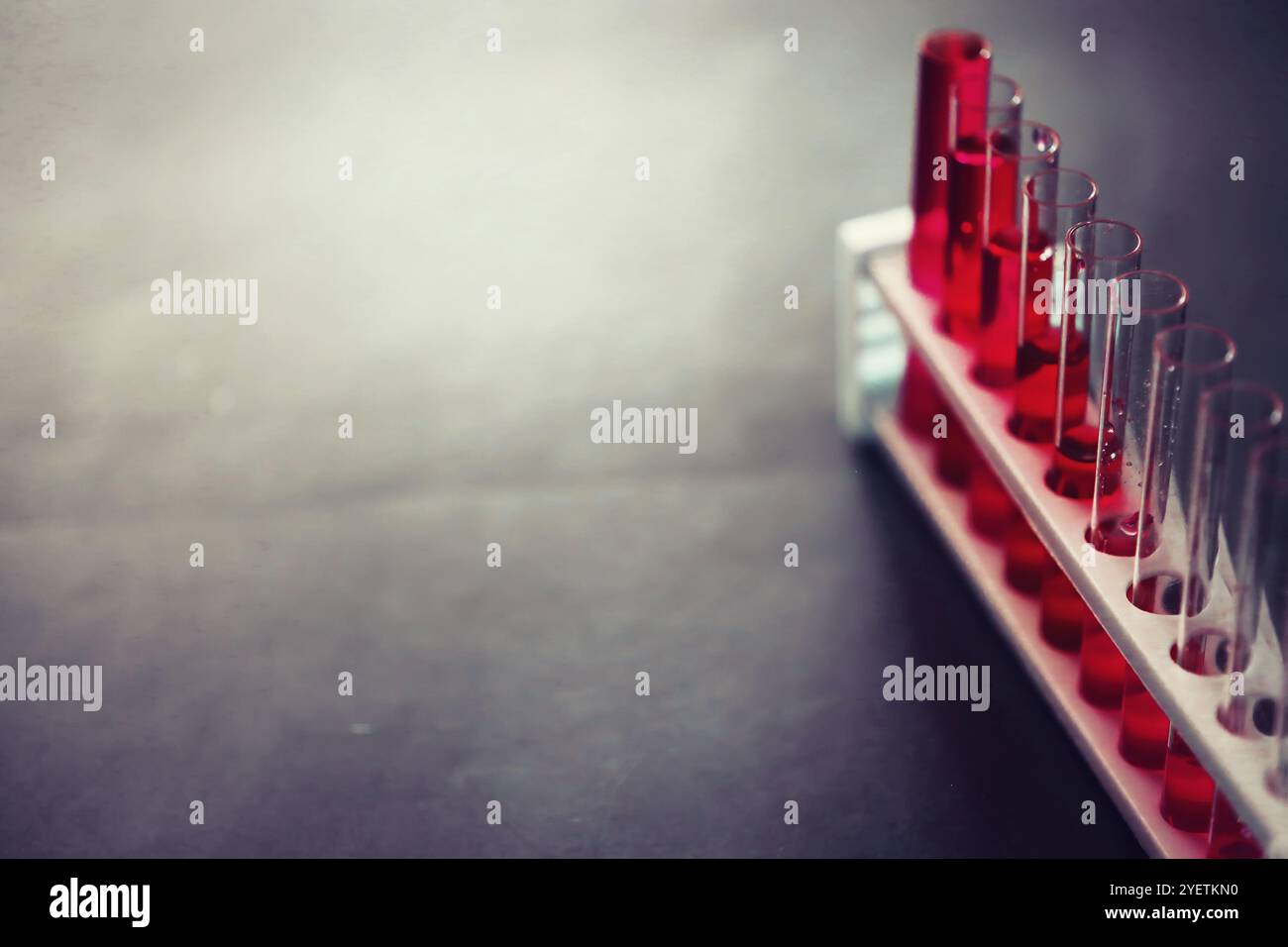 Test tube with blue liquid on laboratory table. Examination of liquid ...