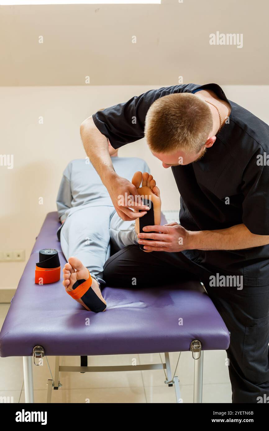 Relaxed doctor sitting feet hi-res stock photography and images - Alamy